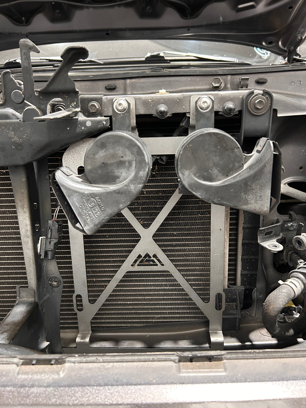 Transmission cooler bracket | Toyota Tacoma (05-15) — Goliath Off Road